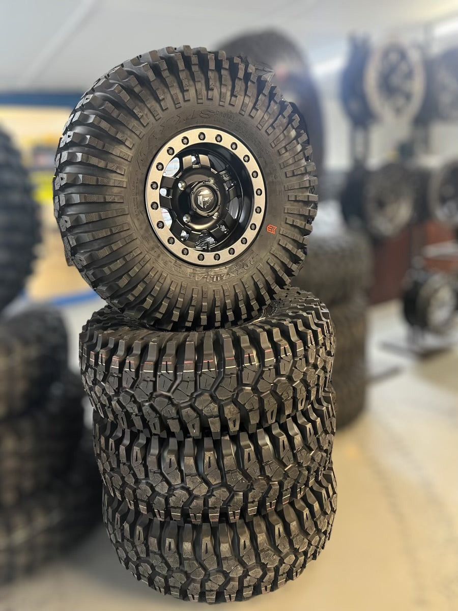 Fuel Anza Beadlock 14X7 4X137 4+3 Wheel mounted on 32X10X14 Sticky Rox ...